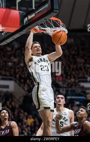 Purdue forward Camden Heide (23) shoots over the defense of UCLA guard ...