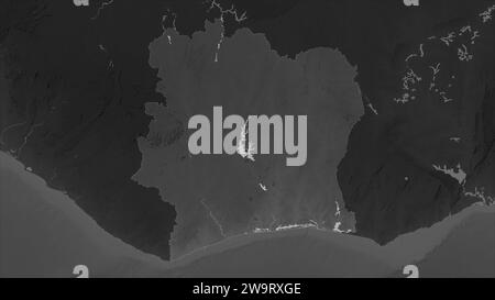 Ivory Coast highlighted on a Grayscale elevation map with lakes and ...