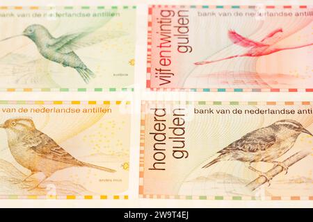 Netherlands Antillean money - Guilder a background Stock Photo - Alamy