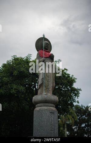 Singapore - July 9 2023: Stone Monk Statue With Red Scarf Stock Photo ...