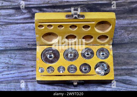 Laboratory weights and masses, used to calibrate scales or balances or ...