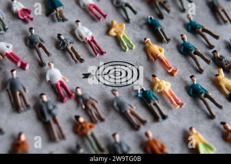 Target board surrounded by group of people. Target audience, target ...