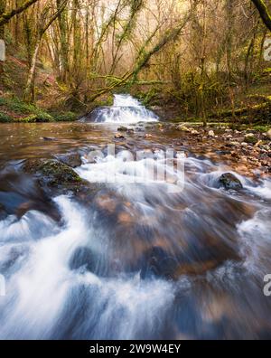 Waterfall on the Autoire river through a woodland near the village of ...