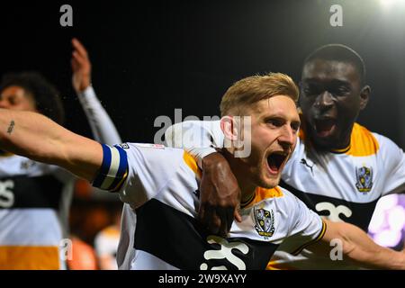 Port Vale's Jesse Debrah celebrates their side's first goal of the game ...