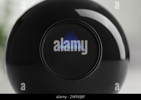 Magic eight ball with prediction Absolutely on light blue background ...