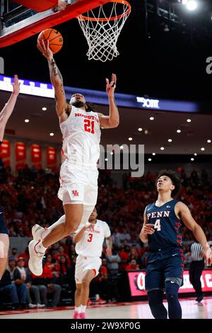Houston guard Emanuel Sharp (21) tries to shoot around Gonzaga guard ...