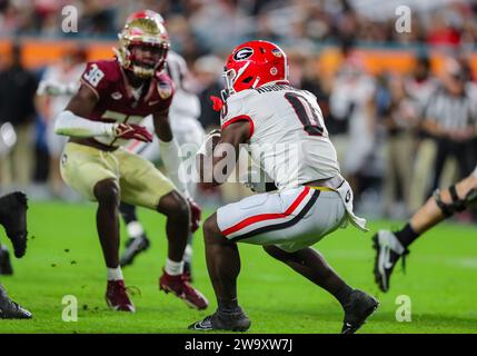 Georgia running back Roderick Robinson II (0) is tackled by Tennessee ...