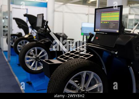 Car wheel balancing device for tire fitting Stock Photo - Alamy