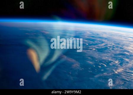 Lens flare and planet Earth from the ISS. Digital enhancement of a NASA ...