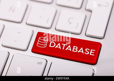 Programming concept: computer keyboard with Database With Cloud icon on ...