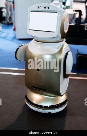Robot consultant with blank screen Stock Photo - Alamy