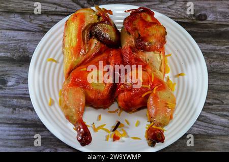 Gulf cuisine of Mandi cooked chicken, a whole chicken made in a Mandi ...