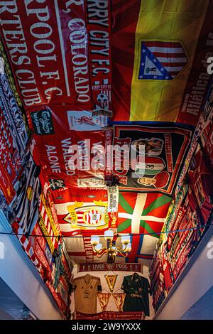Liverpool FC Football scarves. Attributes of fans. The wall is covered ...