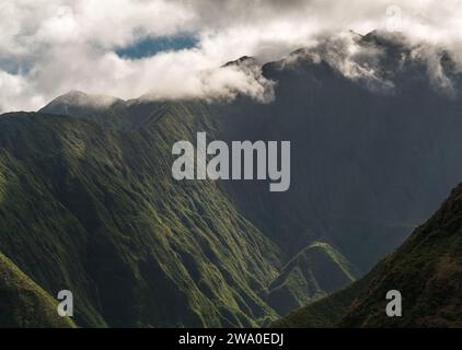 Light plays across the folds of the West Maui Mountains, viewed from ...