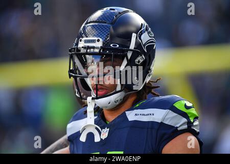 Seattle Seahawks wide receiver Jaxon Smith-Njigba (11) runs out onto ...