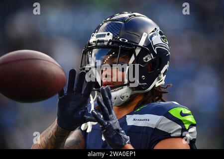 Seattle Seahawks wide receiver Jaxon Smith-Njigba runs the ball against ...