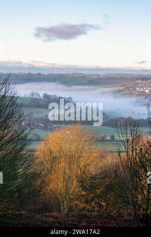 Looking over Bromyard from Bromyard Downs in the morning mist and ...