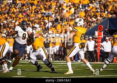 Wyoming quarterback Andrew Peasley (6) throws downfield during the ...