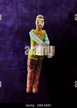 The 19th century Persian puppet representing a young woman in colorful ...