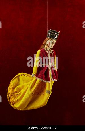 The 19th century Persian puppet representing a young woman in colorful ...