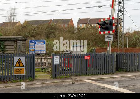 A Network Rail access point information sign next to a low bridge ...