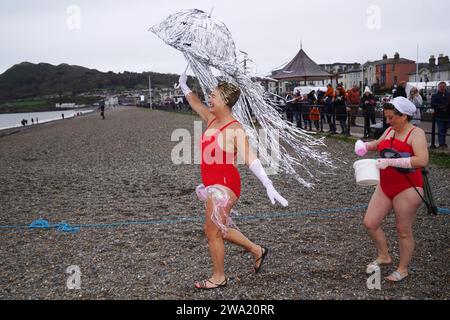 Members of the Bray Beach Bathers take part in the annual New Year’s ...