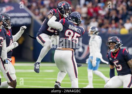 Houston Texans defensive end Derek Barnett (95) tackles Baltimore ...