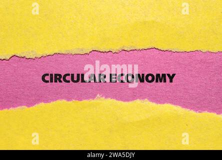Circular economy lettering on ripped paper. Business concept photo ...