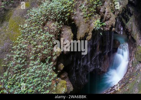 Karst terrain features. There are fast streams and small pools in the ...
