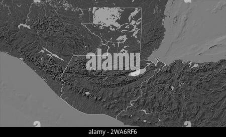 Guatemala outlined on a elevation map colored in sepia tones with lakes ...