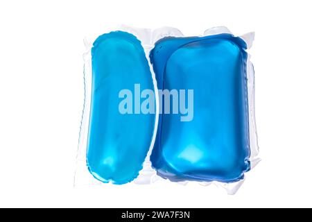 square capsules with blue washing gel on a white background. High ...