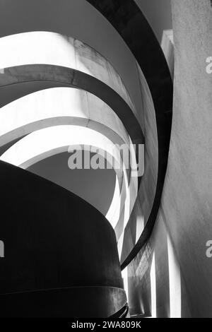 Striking monochrome architectural feature with sweeping curves and a ...