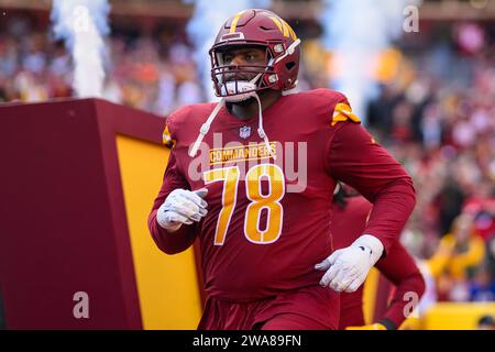 Washington Commanders offensive tackle Cornelius Lucas (78) blocks ...