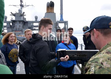 Gunner’s Mate 1st Class Adrian Rodziewicz fires an M203 grenade ...