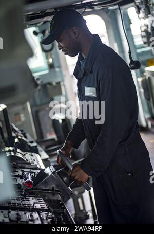 US Navy Helmsman aboard USS Higgins Stock Photo - Alamy