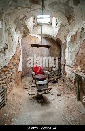 A Barber Chair In Empty Prison Cell at Eastern State Penitentiary ...