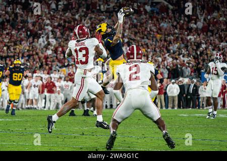 Michigan wide receiver Roman Wilson (1) runs after a catch against the ...