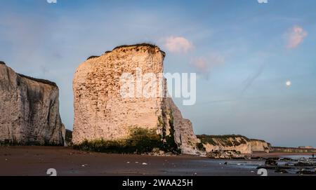 The distinctive sea stacks and archway in the chalk cliffs between ...