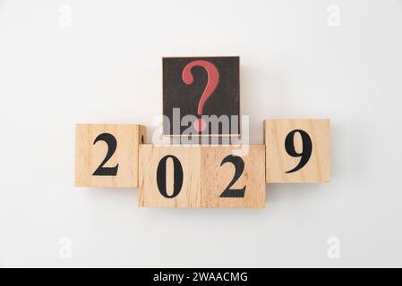 Nine wooden blocks of cubes on gray background with copy space for text ...