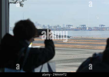 Tokyo, Japan. 3rd Jan, 2024. Stranded passengers are pictured after an ...