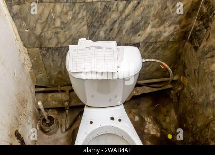 Bathroom toilet arrangement typical for public restrooms in the Soviet ...