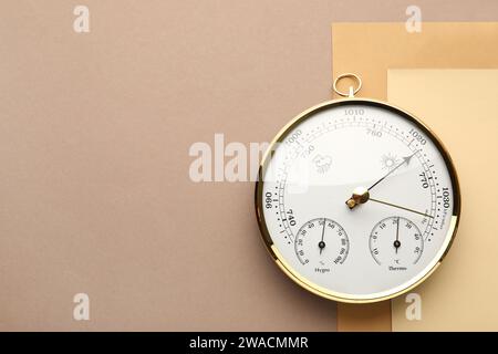 Aneroid barometer on colorful background Stock Photo - Alamy