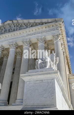 The seated marble statue "Guardian" in the foreground of the US Supreme ...