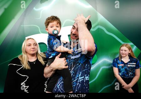 Luke Littler celebrates with family after winning their semi-final ...