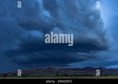 Arcus cumulonimbus storm clouds rolling across farmland Stock Photo - Alamy