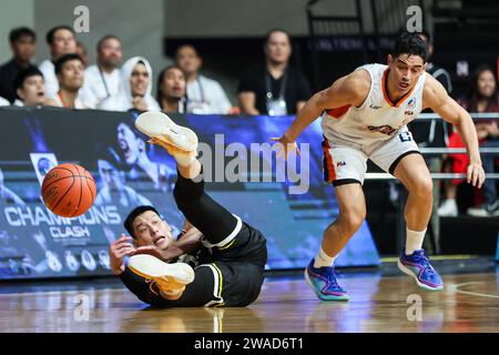 Pasig City, Philippines. 3rd Jan, 2024. Joseph Lin (C) of New Taipei ...
