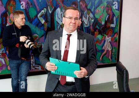 German Defence Minister Boris Pistorius, center, answers questions of ...