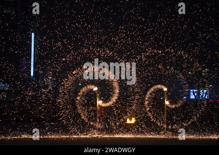 A traditional iron spraying known as Datiehua is staged in Yuyao City ...