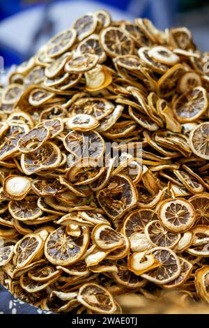 Stacks of dried lemon slices sold in a dry goods store Stock Photo - Alamy