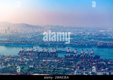 A container terminal at Qingdao Port in east China's Shandong Province ...